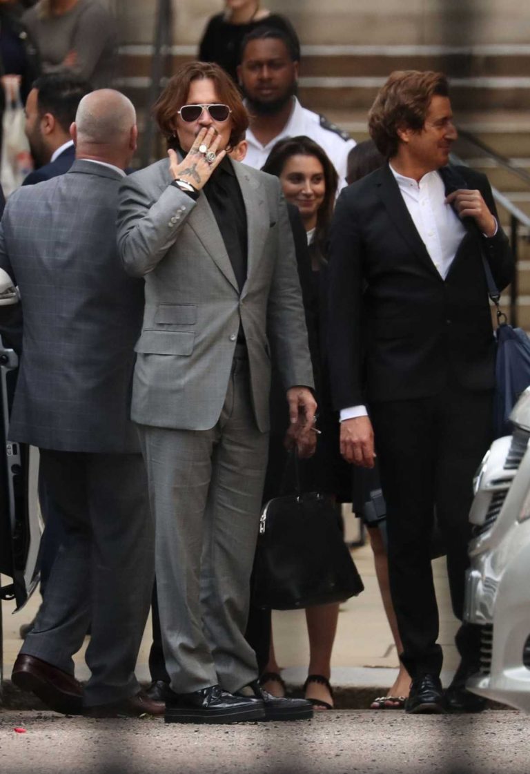 Johnny Depp in a Gray Suit Leaves the Royal Courts of Justice in London ...