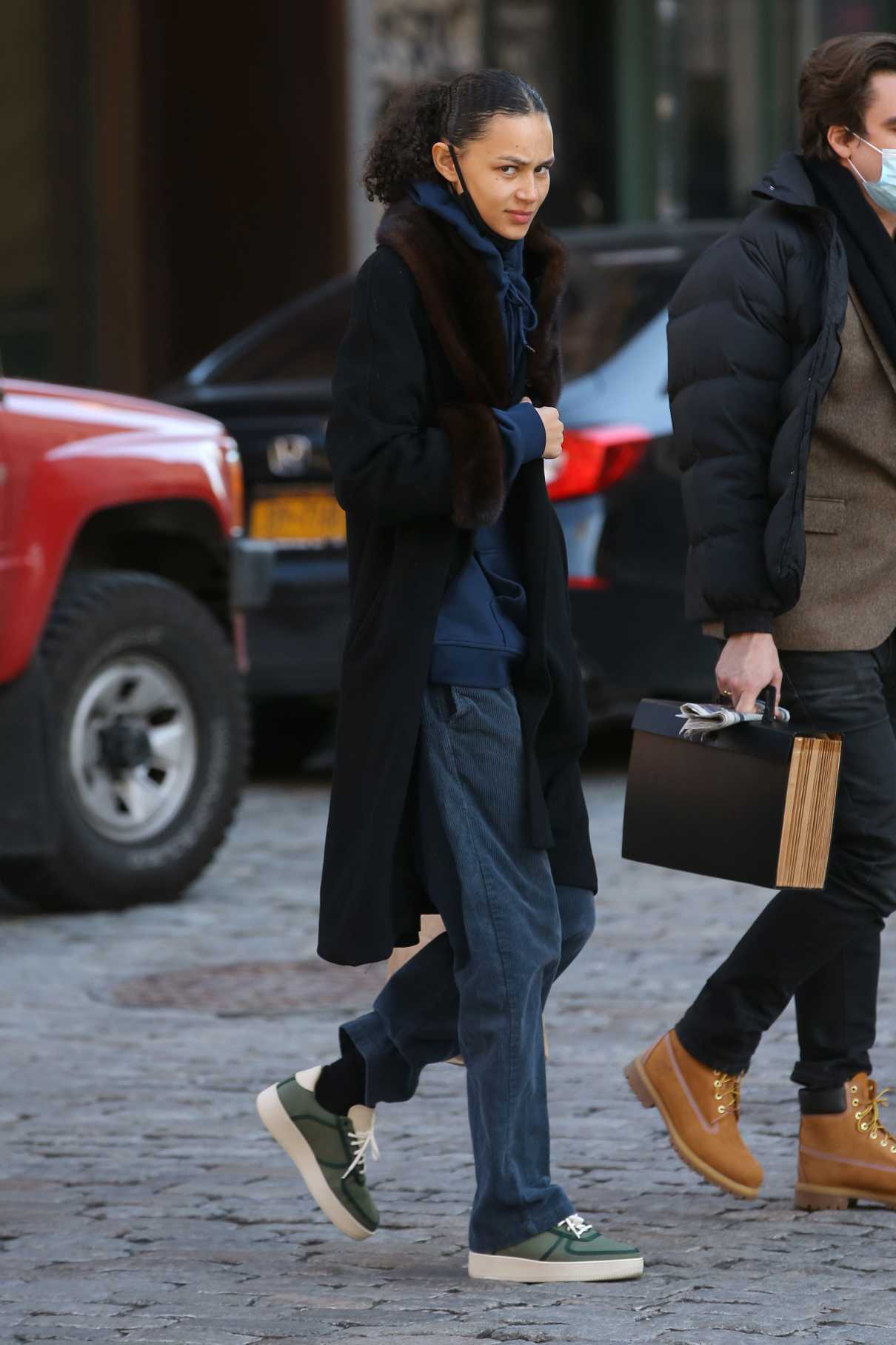Binx Walton in a Black Coat Walks to Lunch with a Male Friend in Soho ...