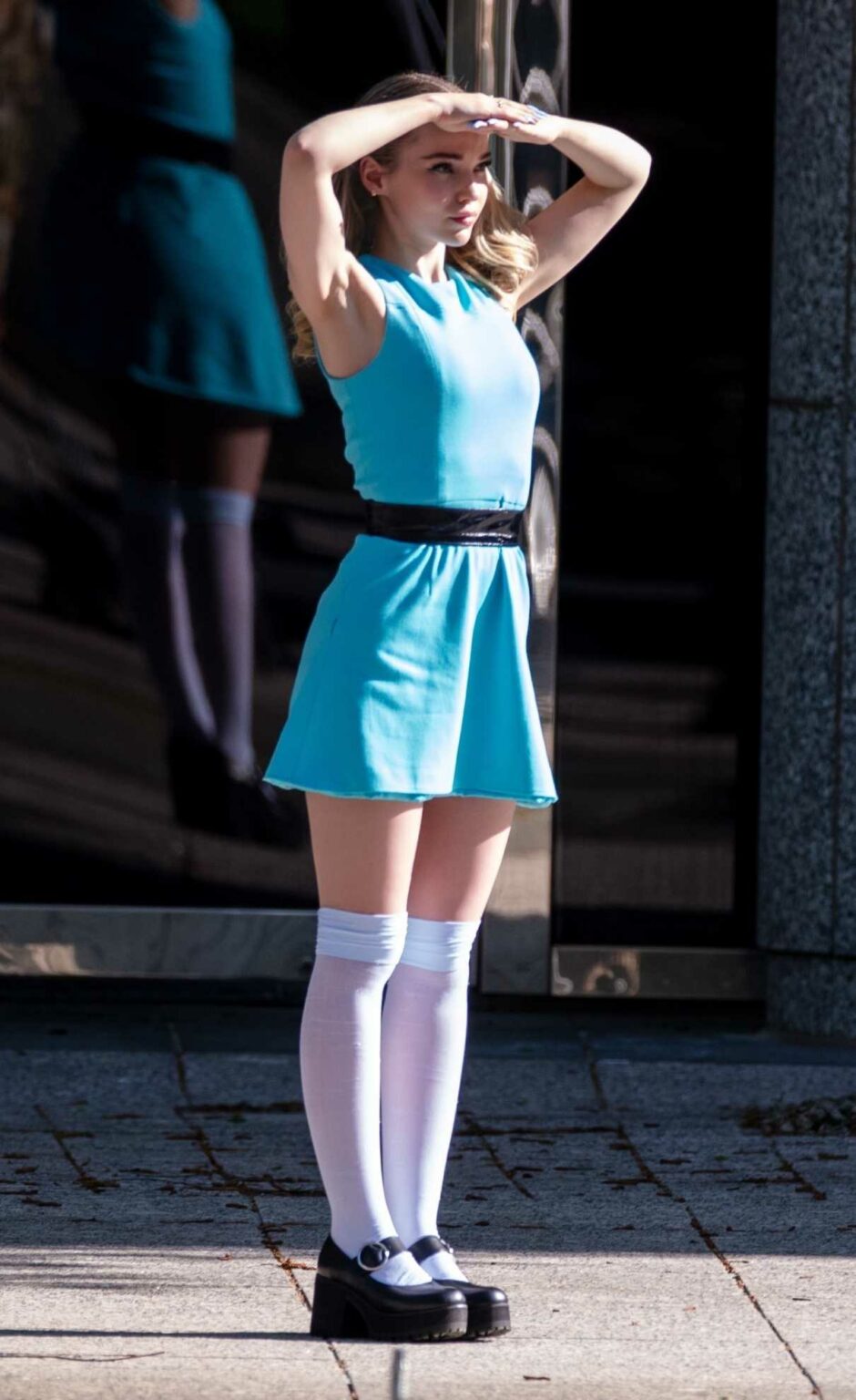 Dove Cameron in a Blue Mini Dress Filming Scenes for Powerpuff in ...