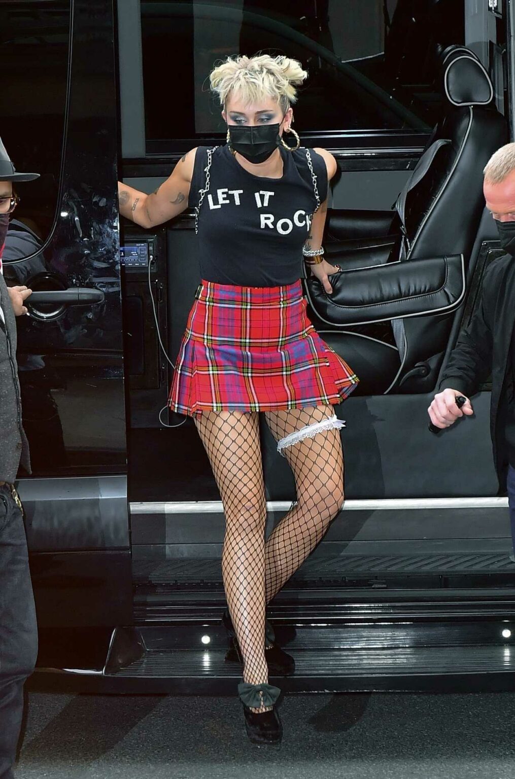 Miley Cyrus in a Red Plaid Mini Skirt Returns to Her Hotel After ...