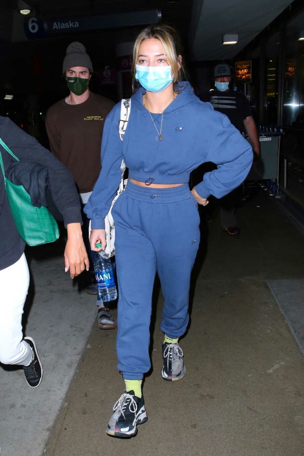 Madelyn Cline in a Blue Sweatsuit Arrives at LAX Airport in LA 05/31 ...