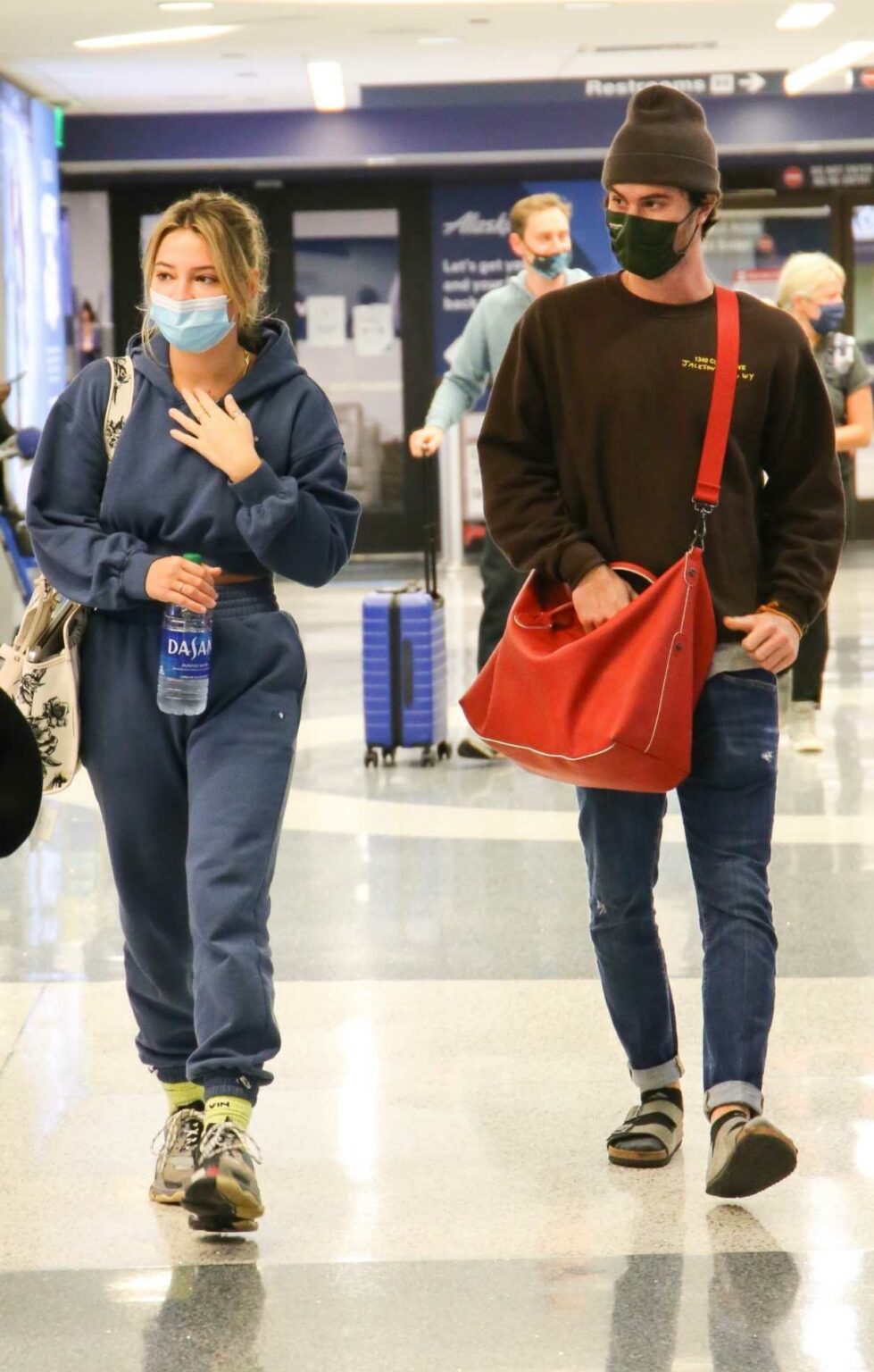 Madelyn Cline in a Blue Sweatsuit Arrives at LAX Airport in LA 05/31 ...