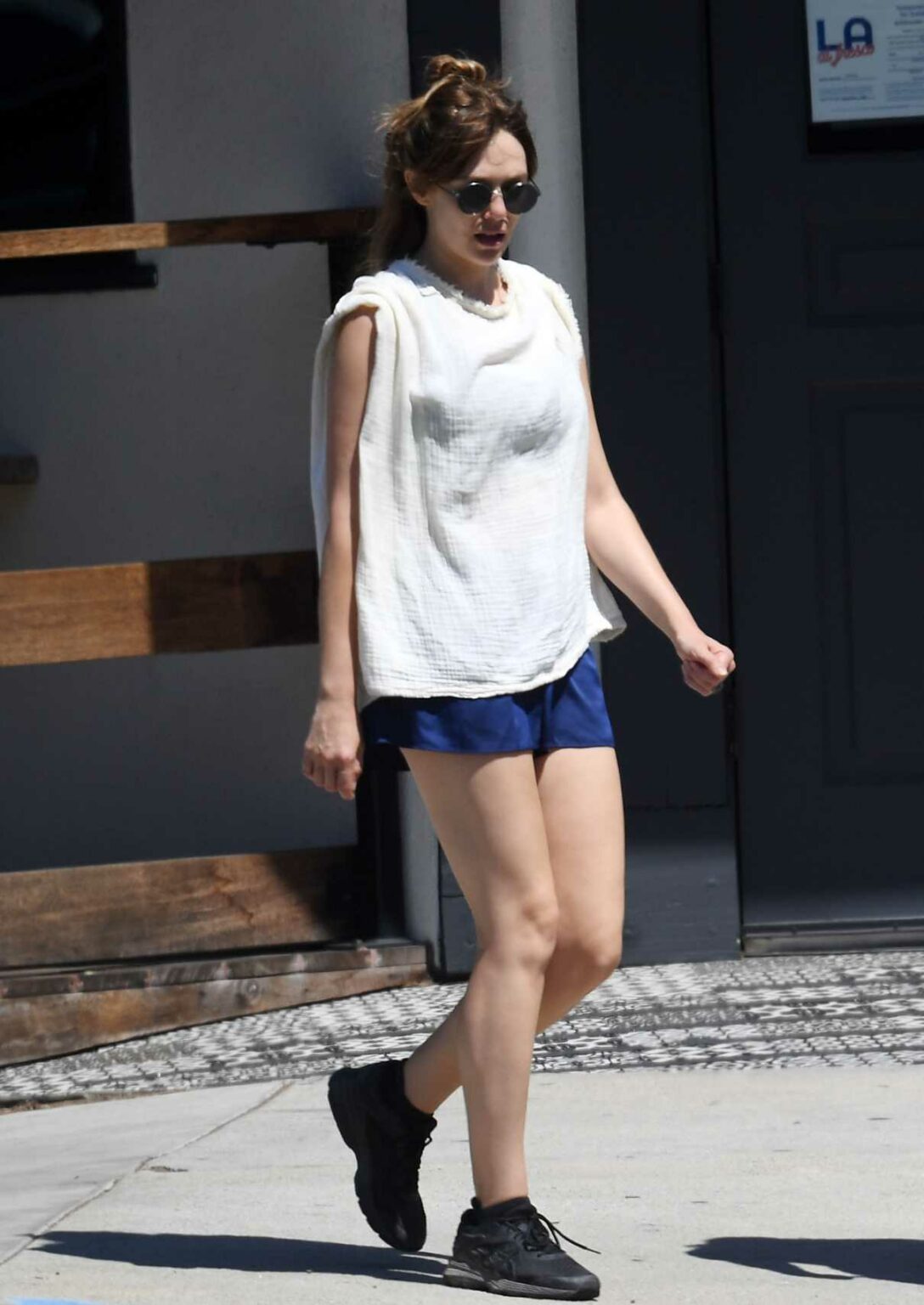 Elizabeth Olsen in a Blue Shorts Steps Out for Coffee in Los Angeles 07 ...