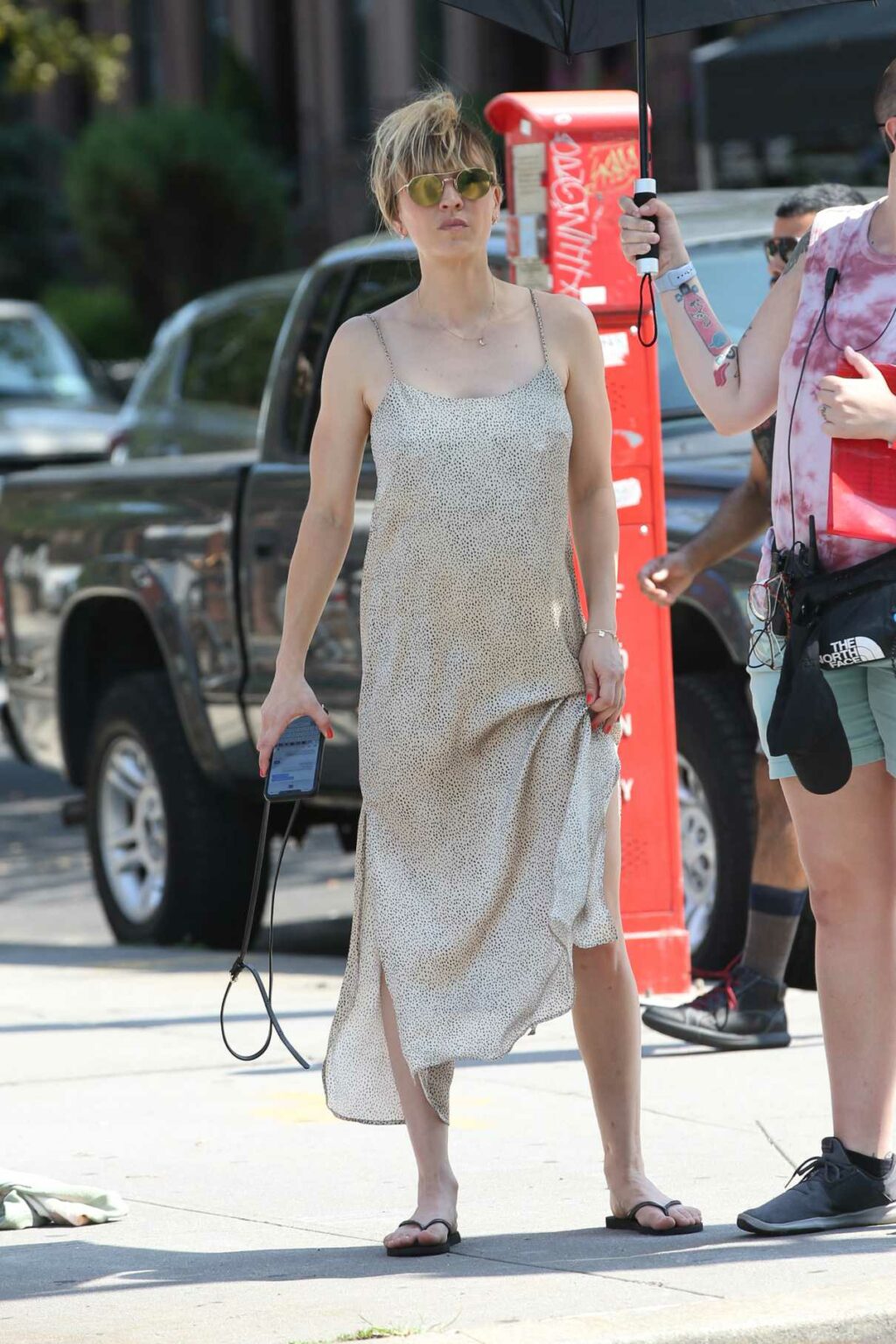 Kaley Cuoco in a Gold Summer Dress on the Set of Meet Cute in Brooklyn ...