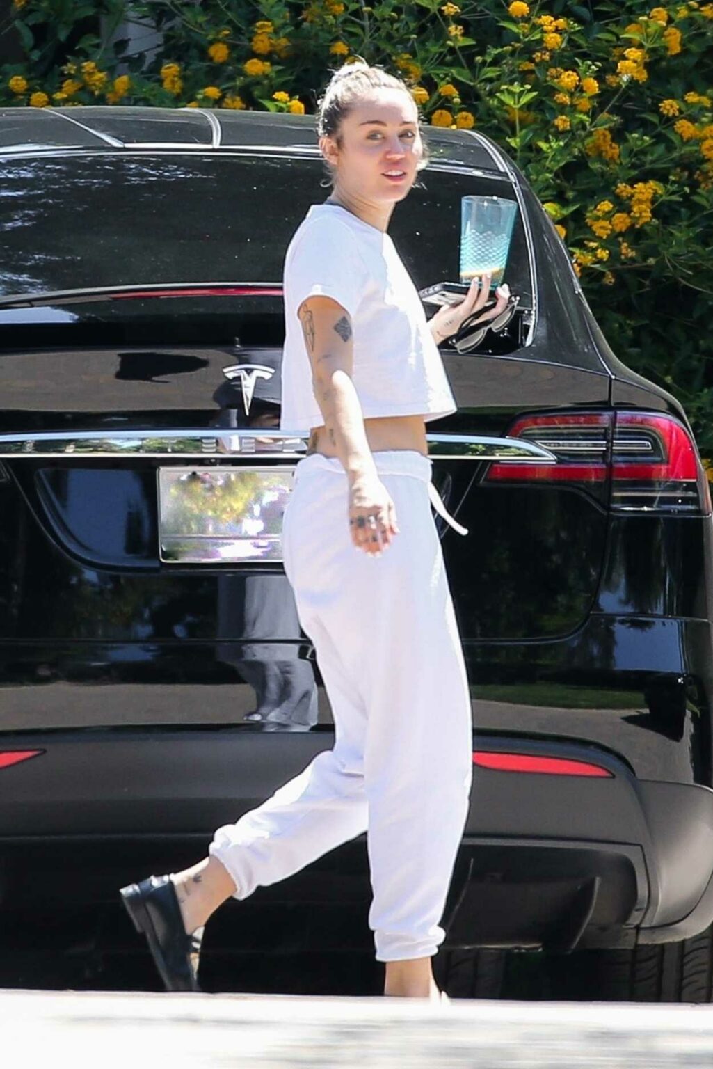 Miley Cyrus in a White Outfit Visits Friends in Malibu 08/05/2021-4 ...